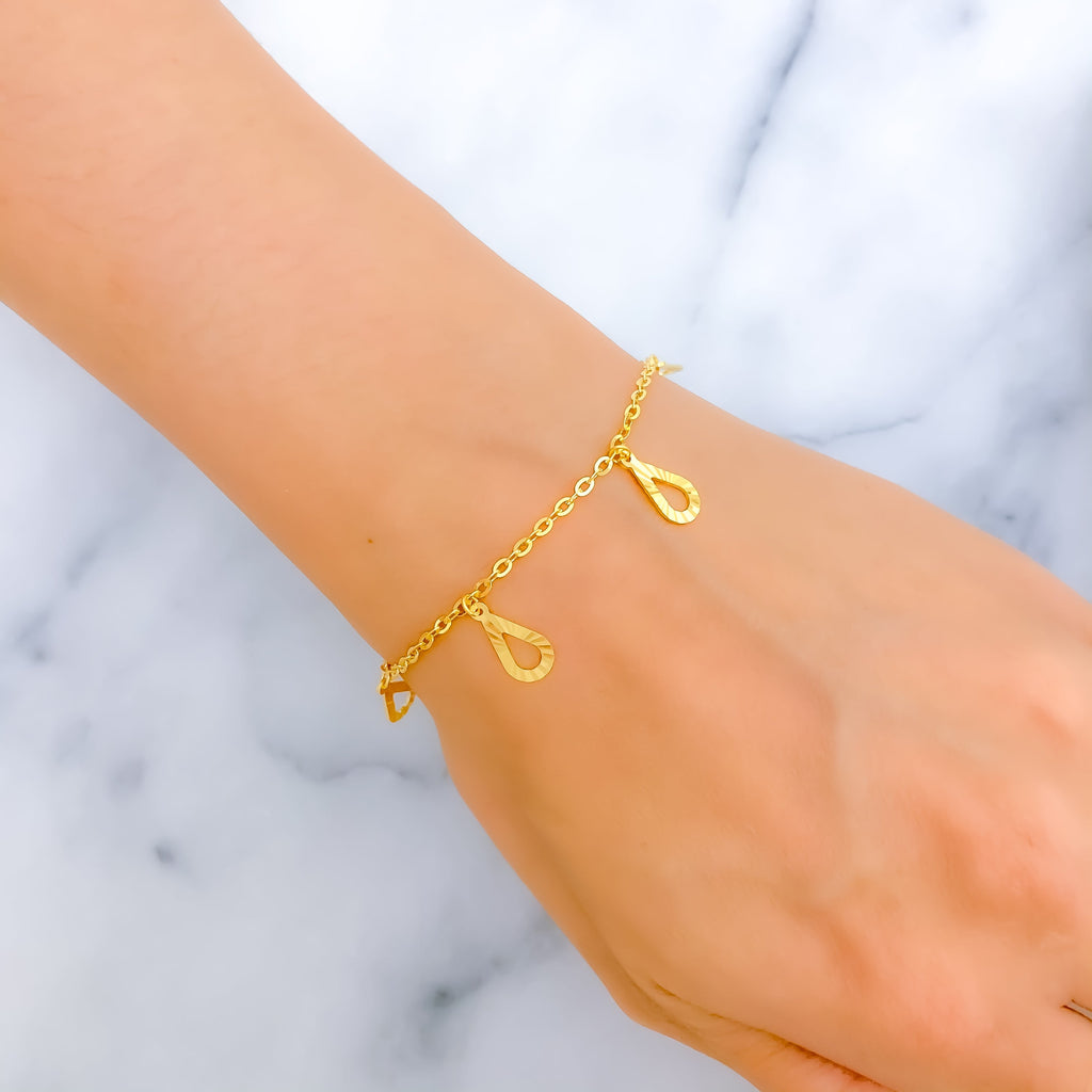 Charming Chic Raindrop 22k Gold Charm Bracelet – Andaaz Jewelers
