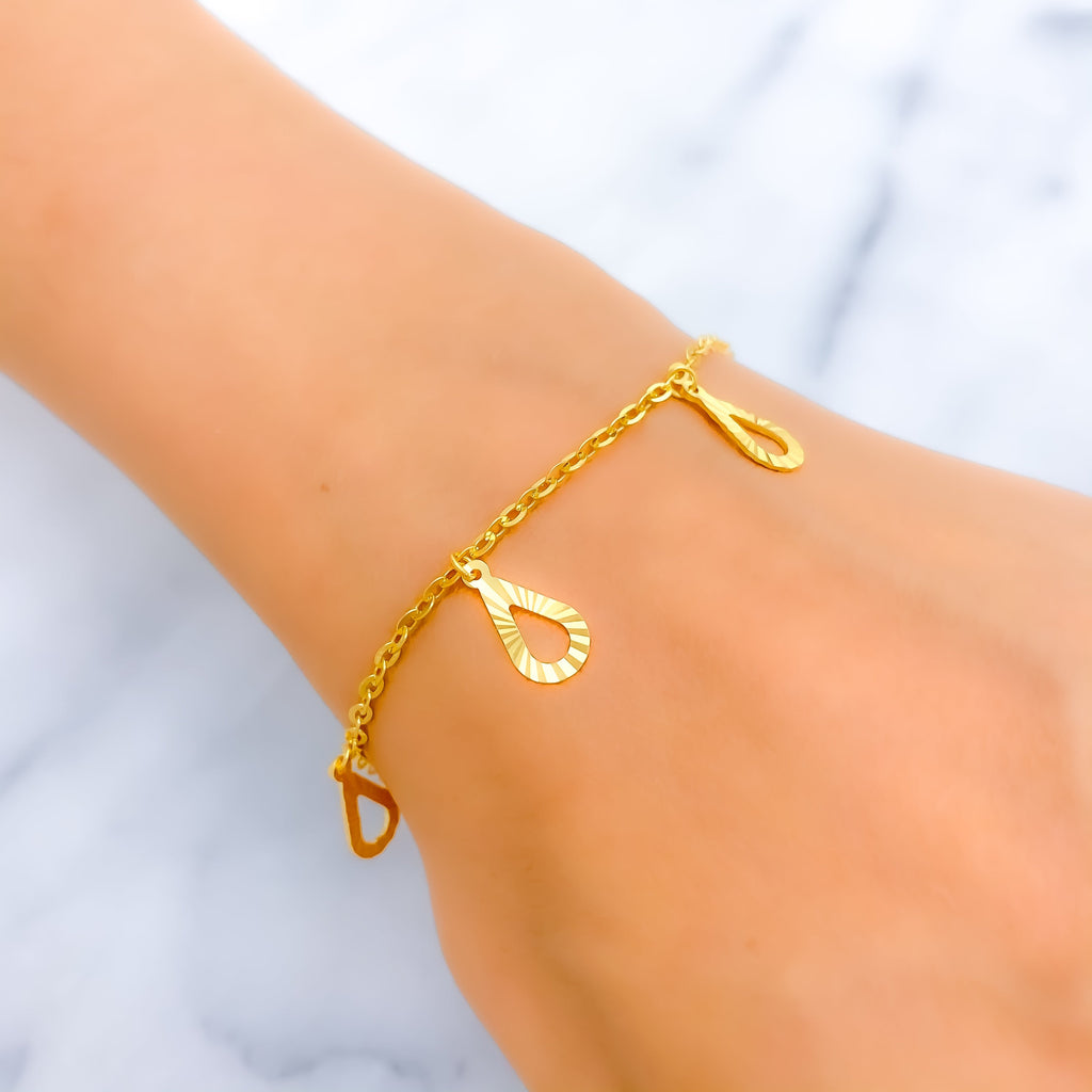 Charming Chic Raindrop 22k Gold Charm Bracelet – Andaaz Jewelers