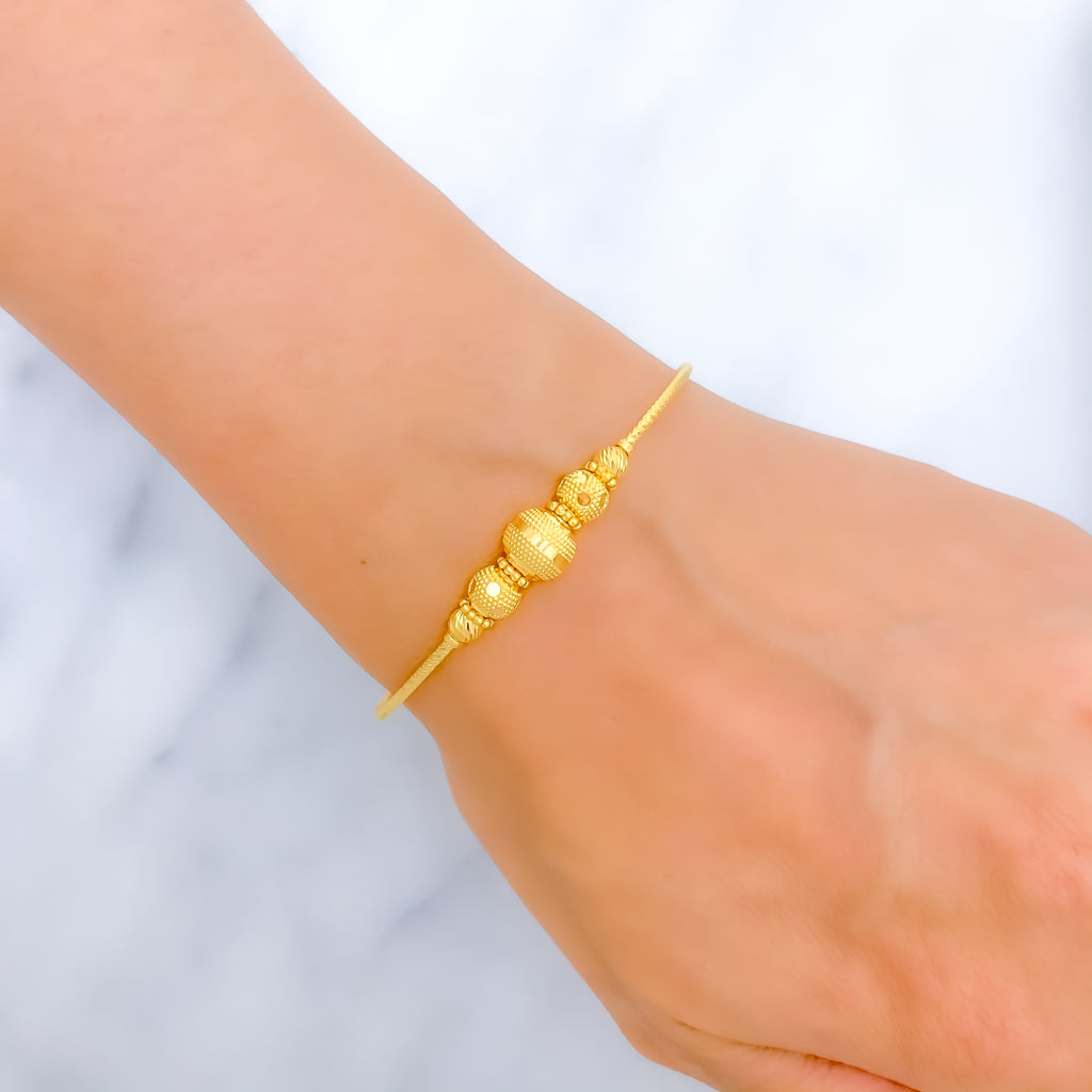 Reflective Triple Orb Gold Bangle Bracelet – Andaaz Jewelers